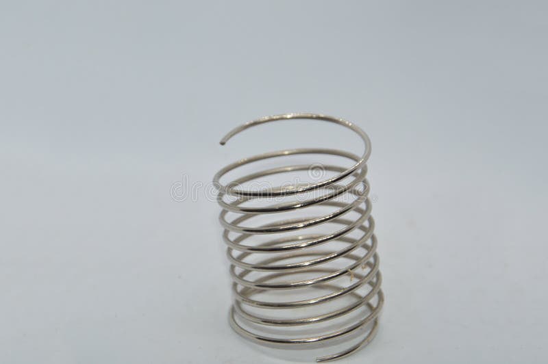 Large Metal Spring on White Background Stock Photo - Image of ...