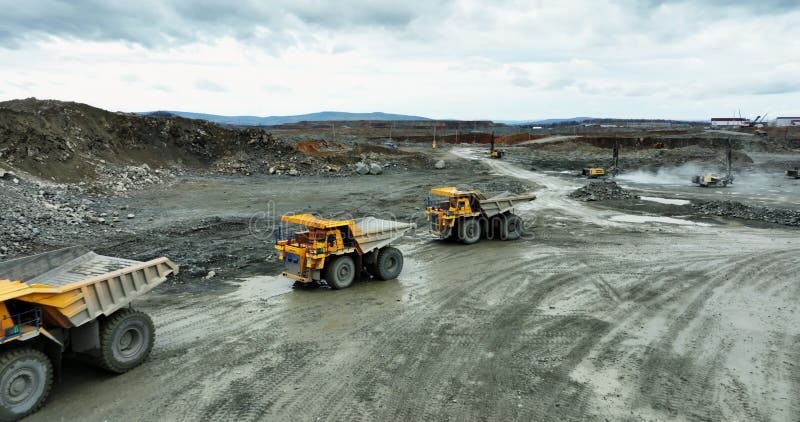 Mining Trucks Transporting Minerals in Open Pit Mine. Stock Clip Stock Video - Video of excavate ...