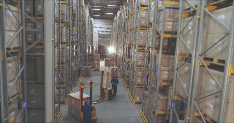 Active Work in the Warehouse, Large Modern Warehouse, Industrial ...