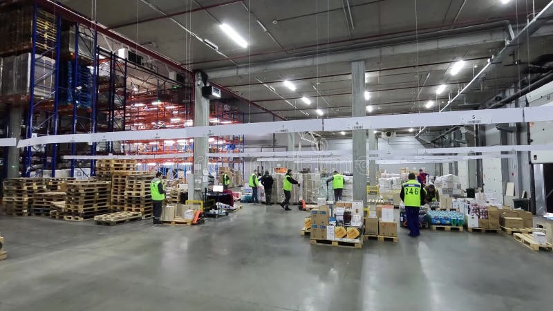 Large Modern Warehouse Timelapse. Workers Work in the Warehouse General ...