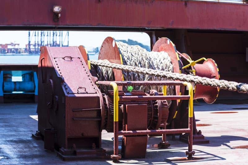Large Mooring Winch on a Ship S Deck, Featuring Thick, Braided Ropes ...