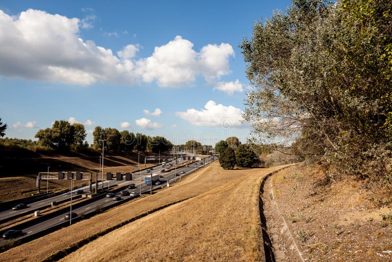 An large motorway stock image. Image of busy, trucks - 80403083