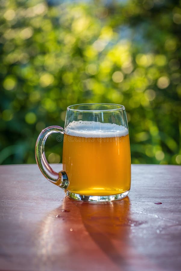 Large Mug of Beer on Table Outside Stock Image - Image of alcohol ...