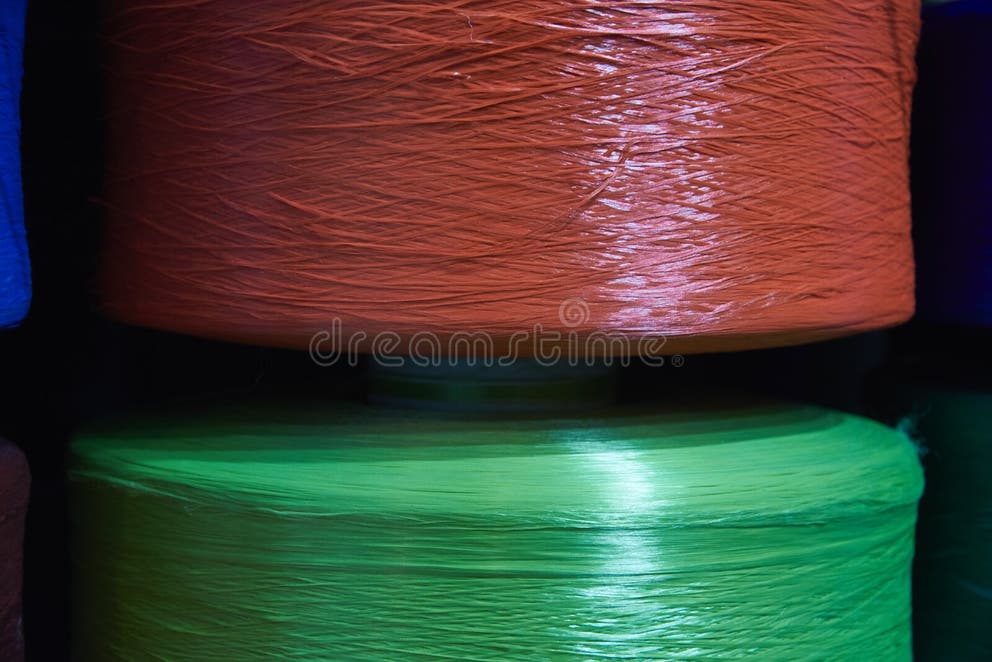 Large Multi Colored Coils with Synthetic Packaging Twine. Background ...