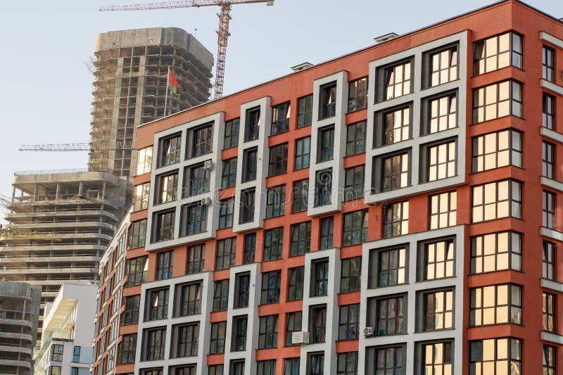 A Large Multistory Building with Many Windows is Under Construction ...