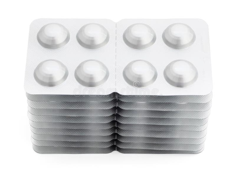 A Large Number of Capsules in a Silver Package on a White Background ...