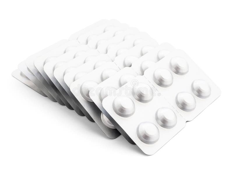 A Large Number of Capsules in a Silver Package on a White Background ...
