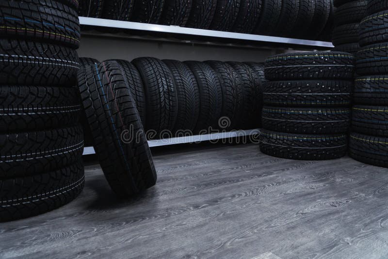 A Large Number of Car Tires. Car Tire Store Stock Photo - Image of ...