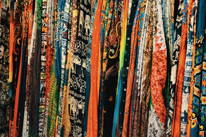 A Large Number of Colorful Shawls, Patterned Textiles, Background Stock ...