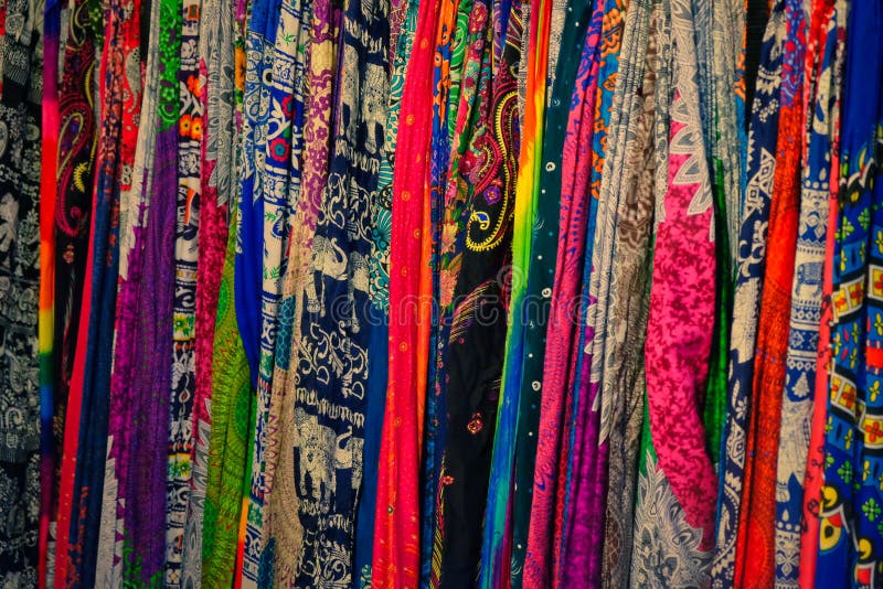 A Large Number of Colorful Shawls, Patterned Textiles, Background Stock ...