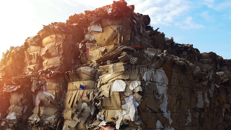 A Large Number of Different Waste Paper for Recycling Folded at Sunset ...