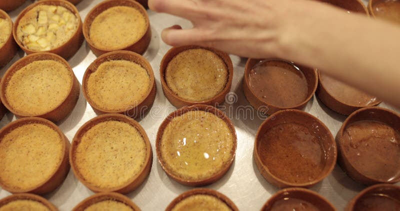 A Large Number of Mini-tarts are Laid Out in Even Rows on a ...