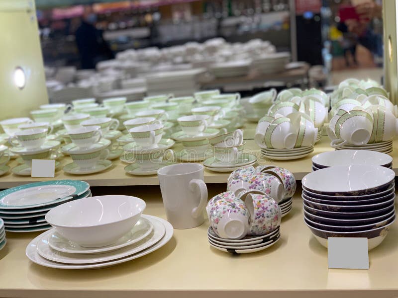 A Large Number of Multi-colored Dishes are on Display in a Store Stock ...