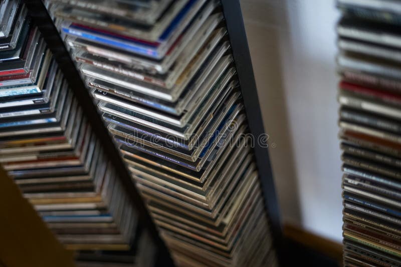 Large Number of Music CDs in CD Rack Test Tower Editorial Photography ...