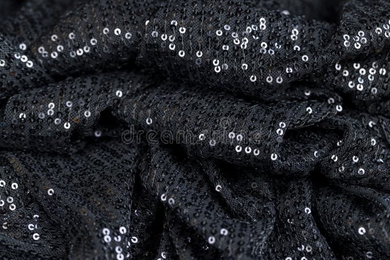 A Large Number of Sequins on a Black Material Stock Image - Image of ...