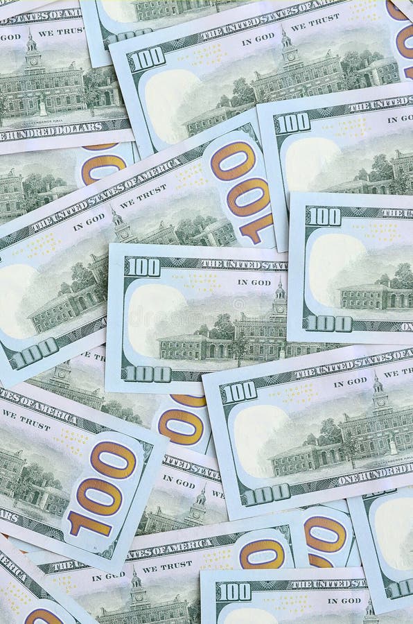 A Large Number of US Dollar Bills of a New Design with a Blue Stripe in ...