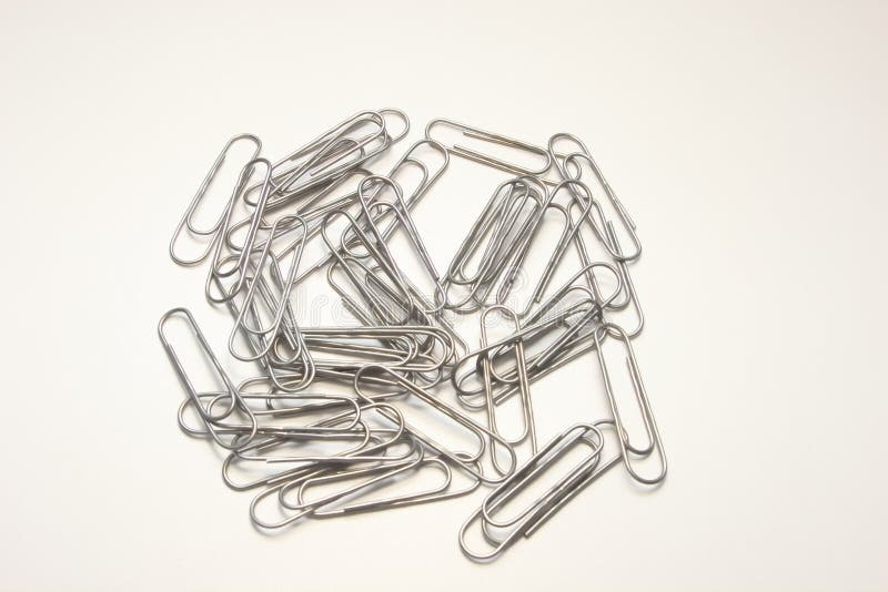 Large Paper Clips on a White Background Stock Photo - Image of cool ...
