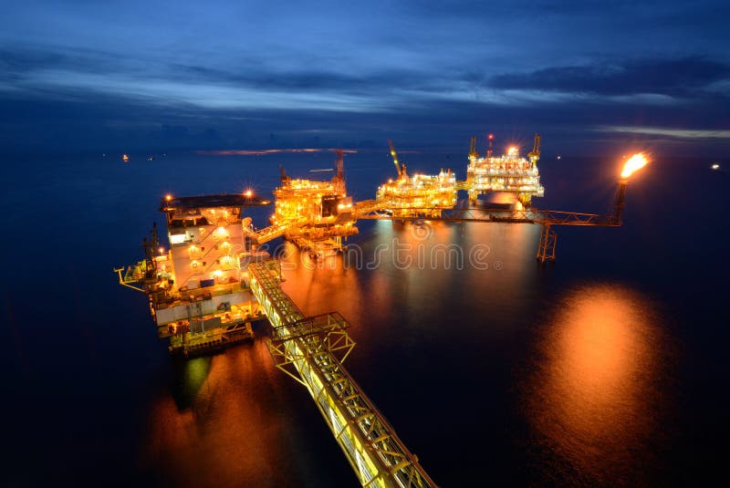 The Large Offshore Oil Rig Drilling Platform at Night Stock Photo ...