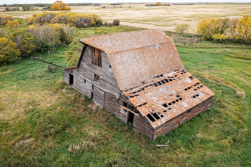 A Large, Old Barn with a Lot of Rust on it Stock Photo - Image of ...