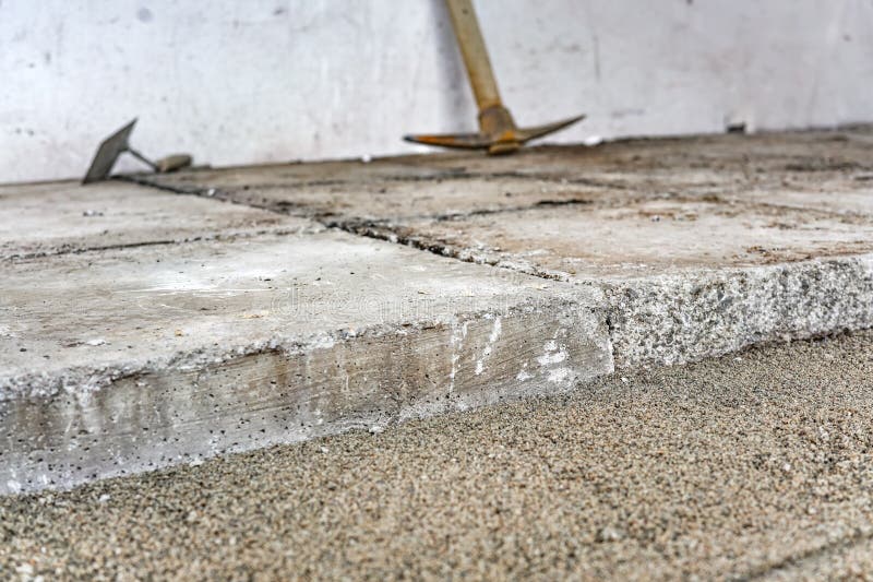 Large Old Concrete Tile Blocks on Layer of Sand - Pavement Construction ...