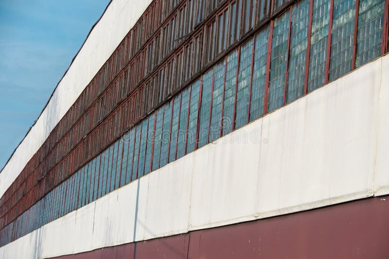 Large Old Long Industrial Building of an Abandoned Factory with Windows ...