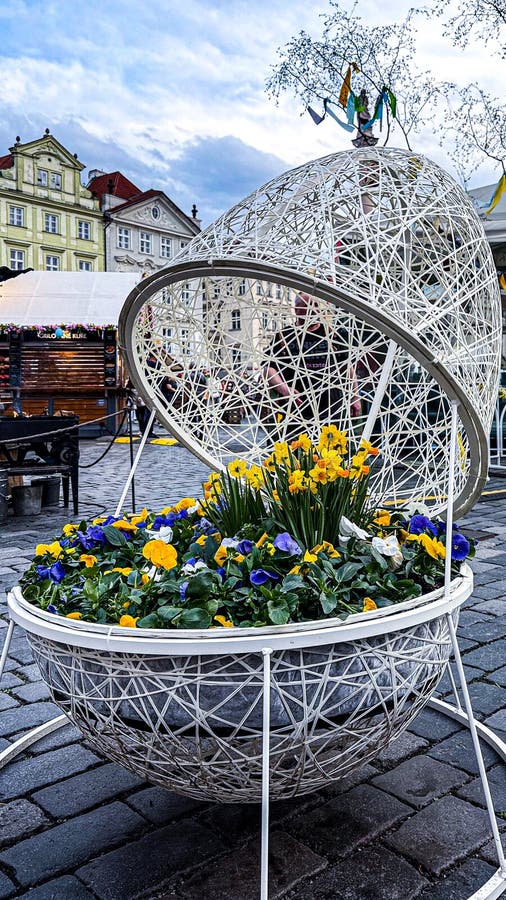 A Large Mesh Egg with Flowers Inside Stock Image - Image of sculpture ...