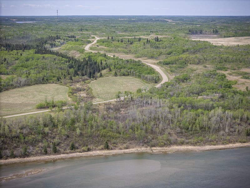 Large, Open Field with a Road Running through it Stock Image - Image of ...