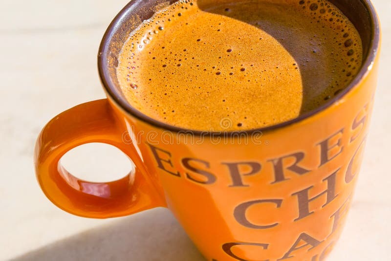 Large Orange Coffee Cup on the Table Closeup Stock Image - Image of ...