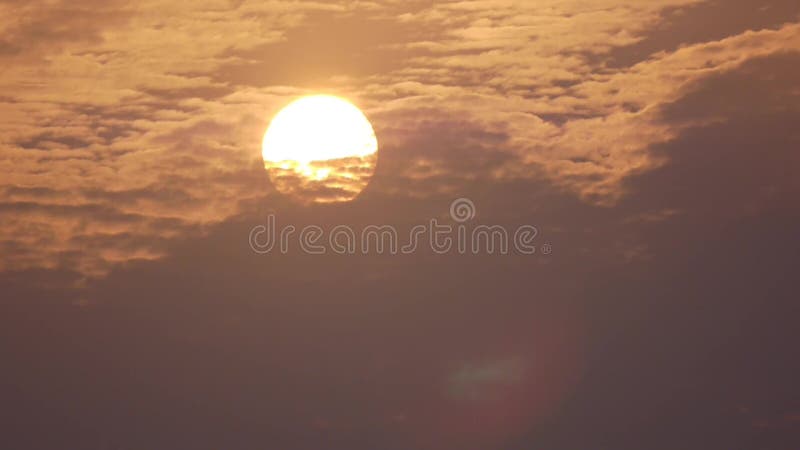 Orange Sunset Reflection on the Ocean Water with Cloudy Sky in the ...