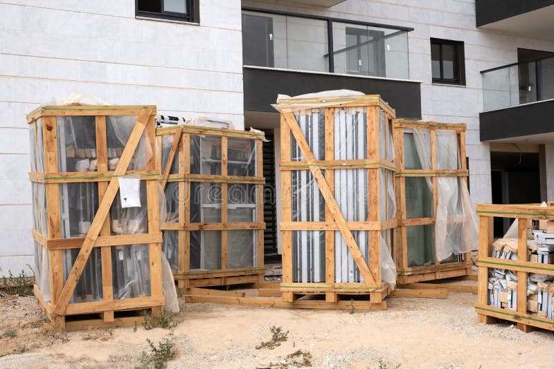 Package of New Glass Doors on the Site Construction. Stock Image ...