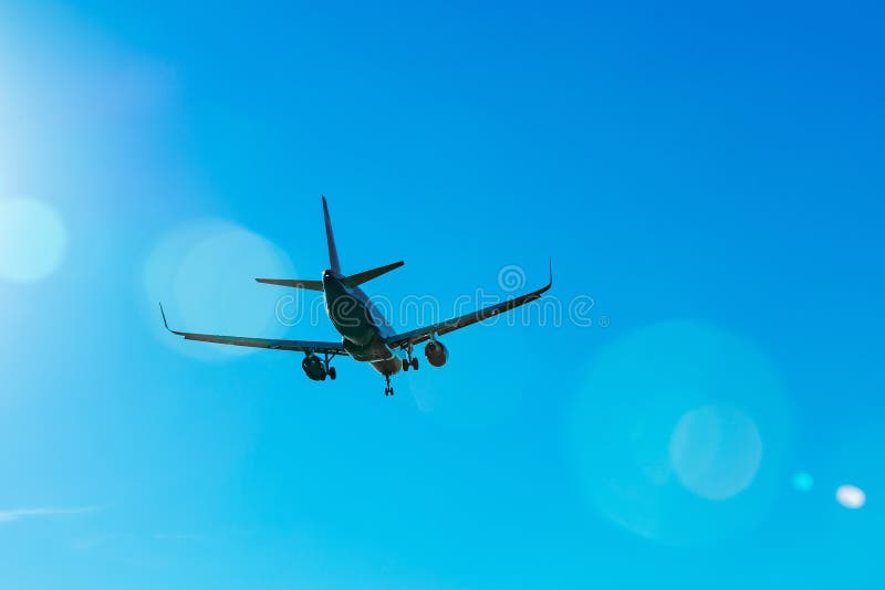 Large Passenger Plane Flying in the Blue Sky Stock Image - Image of ...