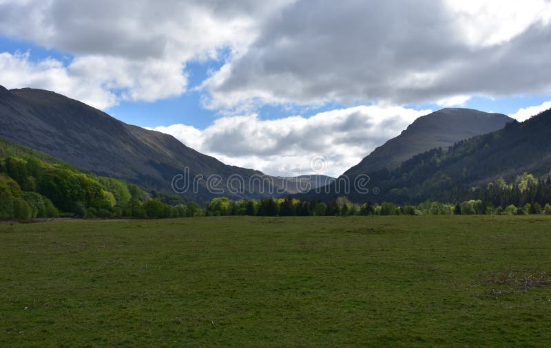 Large Pasture in a Valley between Two Mountain Ranges Stock Photo ...