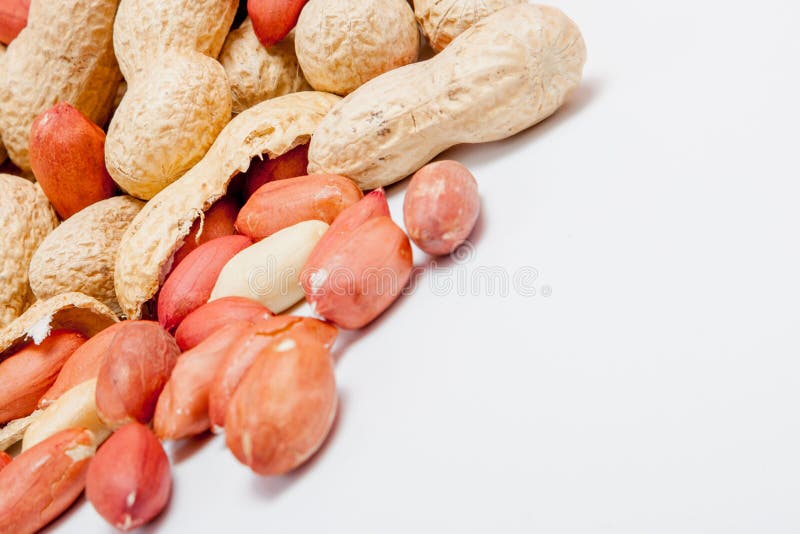 Large Peeled Peanuts Close-up of Beans in the Shell. Unpeeled Peanuts ...