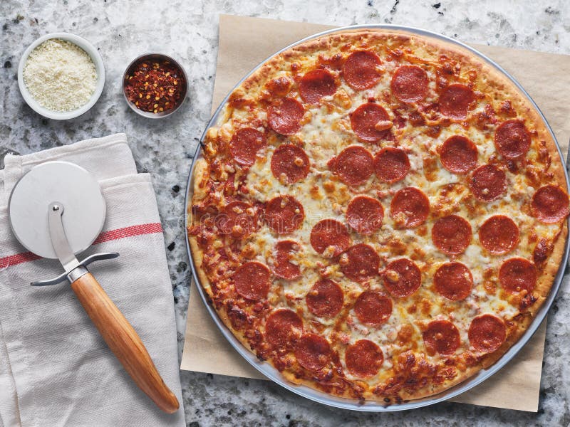 Large Pepperoni Pizza on Marble Counter Stock Photo - Image of food ...