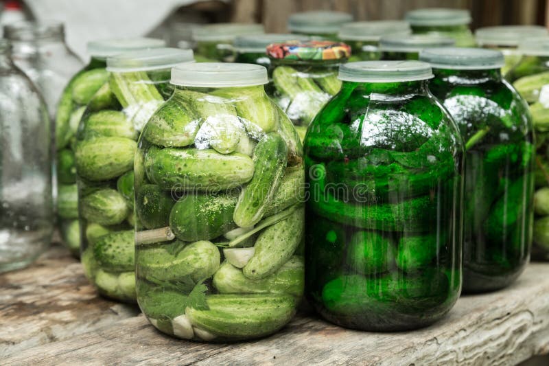 Large pickles in glass jar stock image. Image of container - 288925997