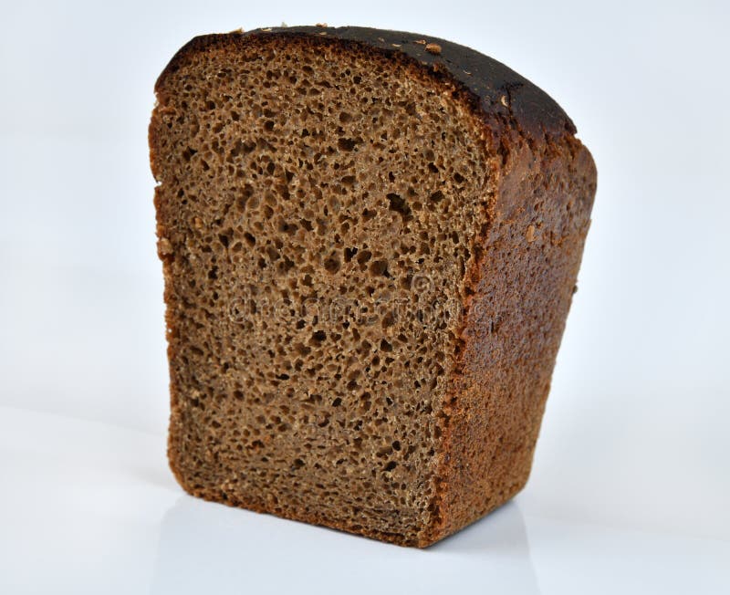 Large Piece of Black Rye Bread on Light Background Stock Photo - Image ...