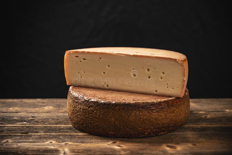 Large piece of cheese stock photo. Image of piece, brown - 324575568