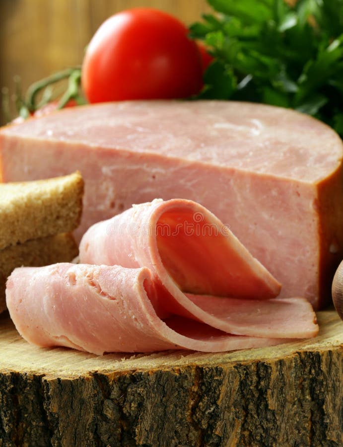 Large Piece of Ham on a Cutting Board Stock Image - Image of background ...