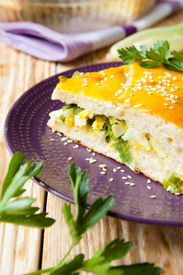 Large Piece of the Pie with Spring Onions and Eggs Stock Photo - Image ...