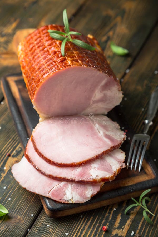 A Large Piece of Smoked Ham. Meat on the Table Stock Image - Image of ...