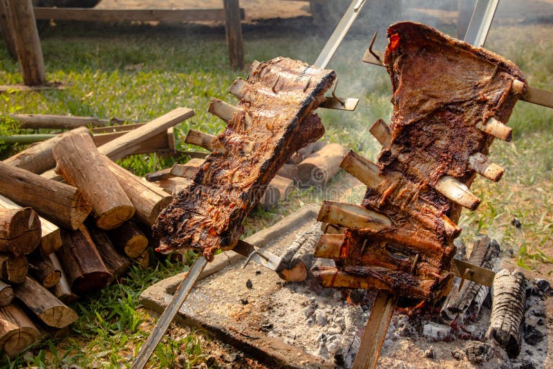 Large Pieces of Beef Rib. Typical BBQ Campfire Using Skewers Stock ...