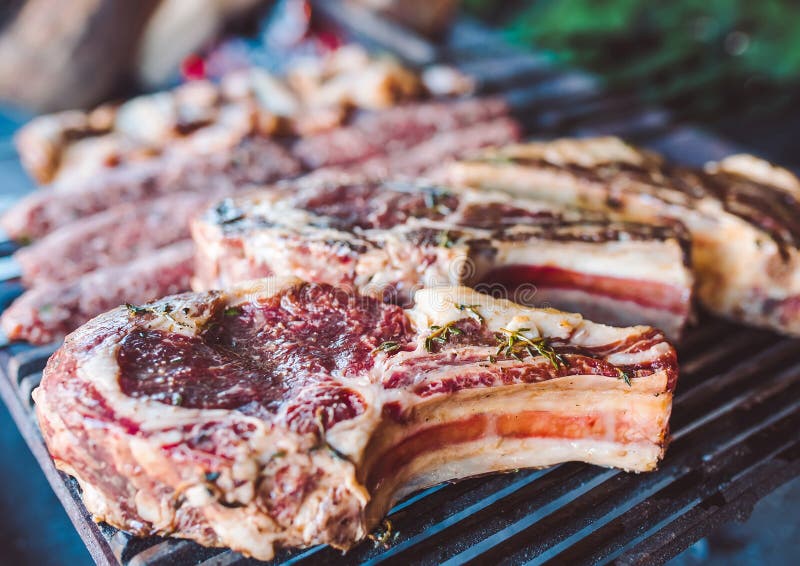 Meat on a Grid Under Coals and Next To a Fire Stock Image - Image of ...