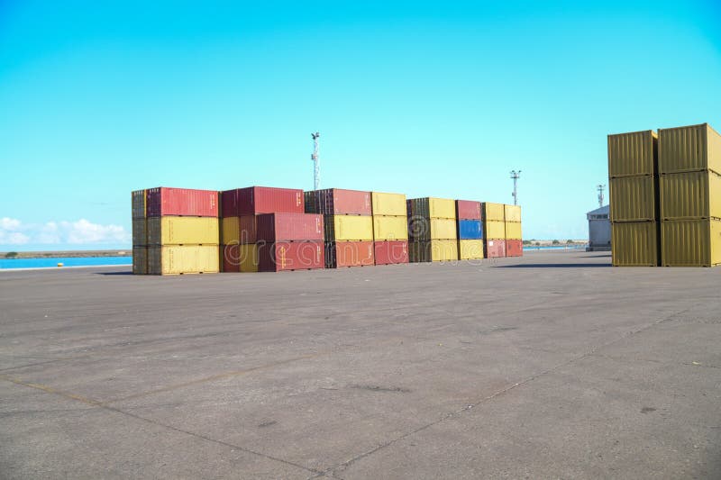 A Large Pile of Containers are Stacked in a Warehouse Stock Photo ...