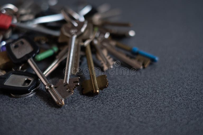 Large Pile of Different Keys on Gray Background Stock Photo - Image of ...