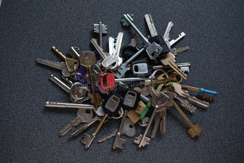 Large Pile of Different Keys on Gray Background Stock Photo - Image of ...