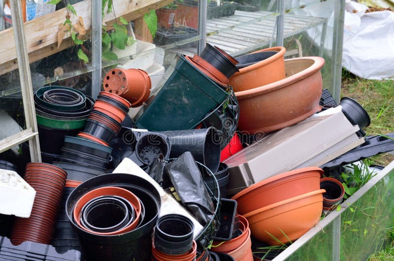 Large pile of empty pots stock photo. Image of pots, flower - 41638594