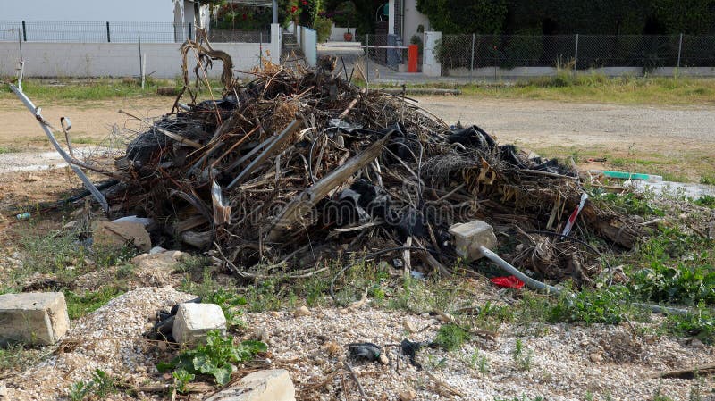 Large Pile of Garbage, Bark, Trees, Stones at a Construction Site Stock ...