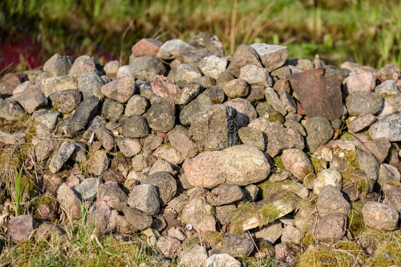 Large pile of rocks stock image. Image of person, green - 126460757