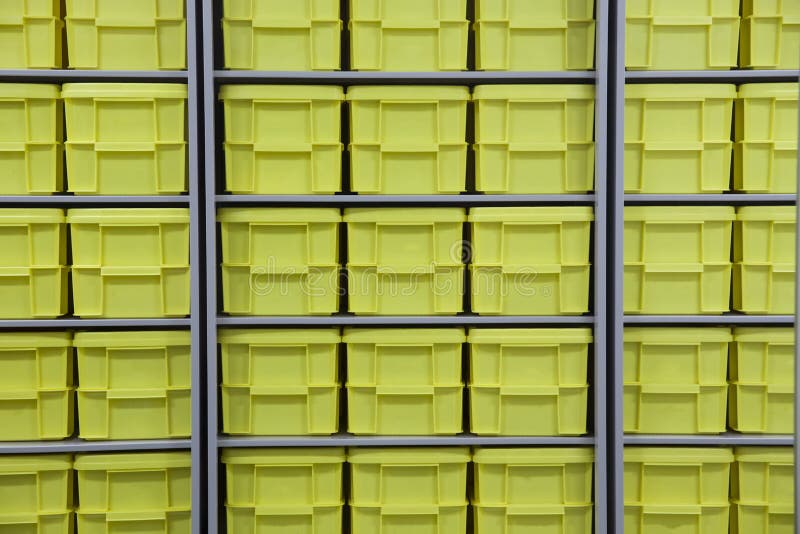 Large Pile of Yellow Plastic Boxes Stock Image - Image of toolbox, tool ...