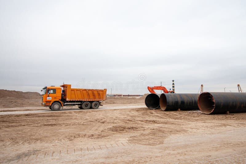 Large Pipes at Construction Site Stock Photo - Image of work, outside ...